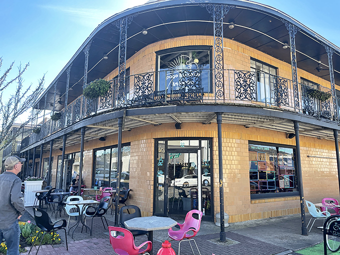 The French Quarter building stands as Fairhope's architectural showstopper, its wrought-iron balconies practically begging you to sip something cold while people-watching below.