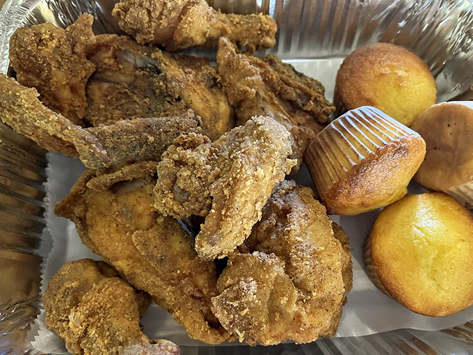 Fried chicken nirvana in aluminum container form. If heaven had a takeout option, this golden-crusted feast would be it.