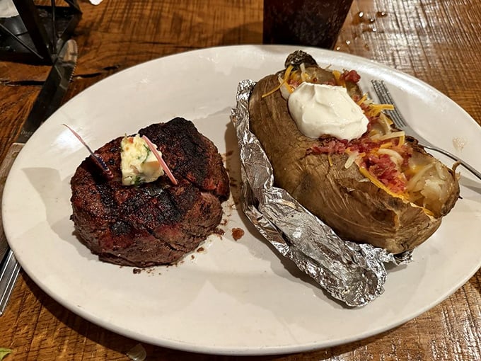 This filet and loaded potato duo is the Lennon and McCartney of steakhouse pairings&mdash;separate geniuses, better together.