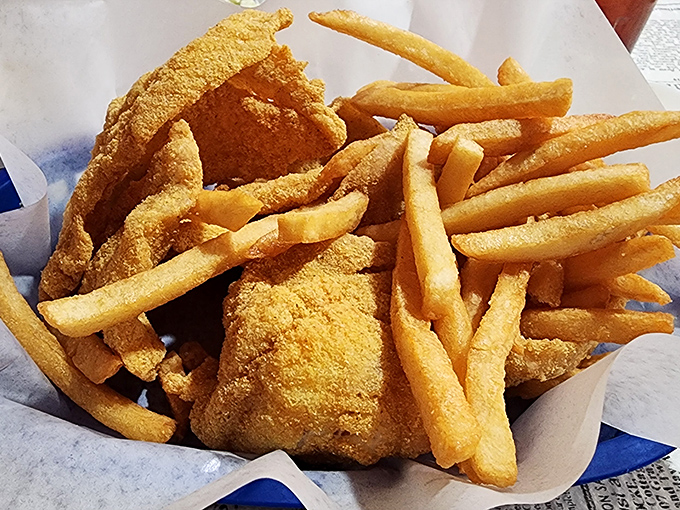 The perfect marriage of land and sea: golden catfish nestled against crispy fries. Like peanut butter and jelly, only with more delicious guilt.
