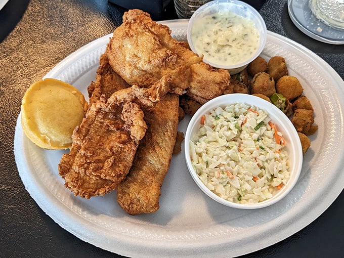 Crispy fried flounder that shatters like glass, paired with creamy coleslaw and a biscuit that's practically begging for butter.