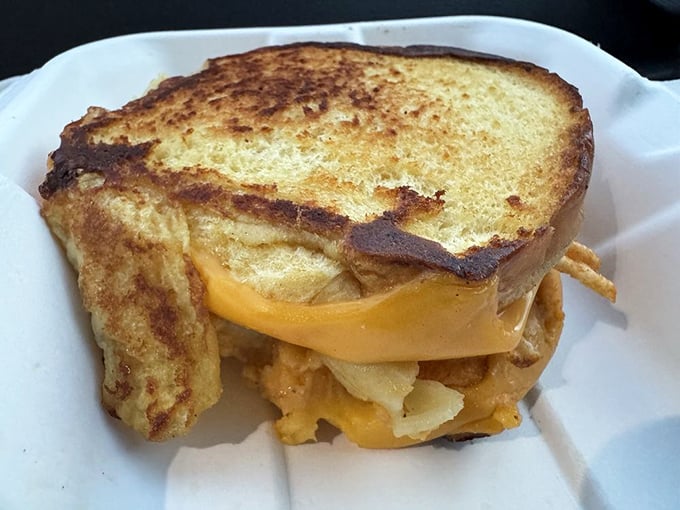 This isn't just a sandwich&mdash;it's an engineering marvel of mac and cheese stabilized between perfectly grilled bread. Science never tasted so good.