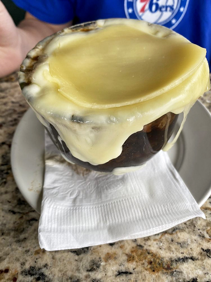 French onion soup that's worth the occasional cheese-pull mustache. This bowl has more layers than your favorite drama series.