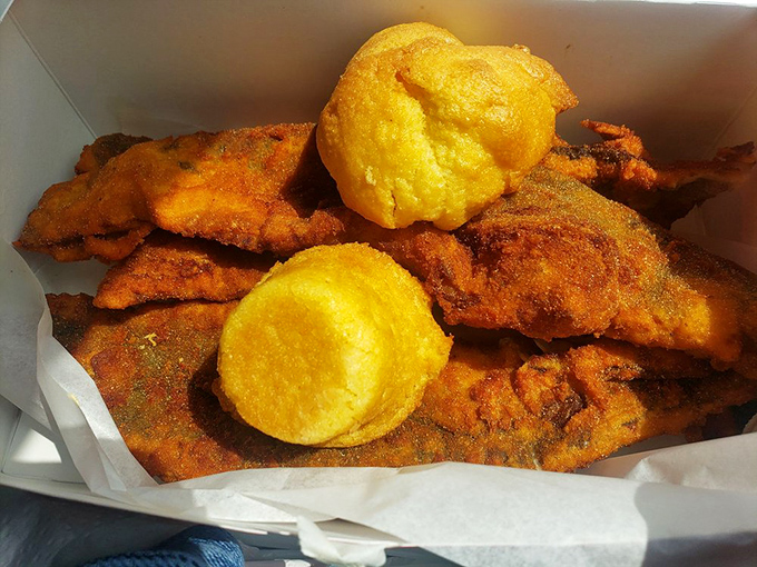 Cornbread muffins alongside crispy catfish&mdash;a combination so perfect it should have its own national holiday.