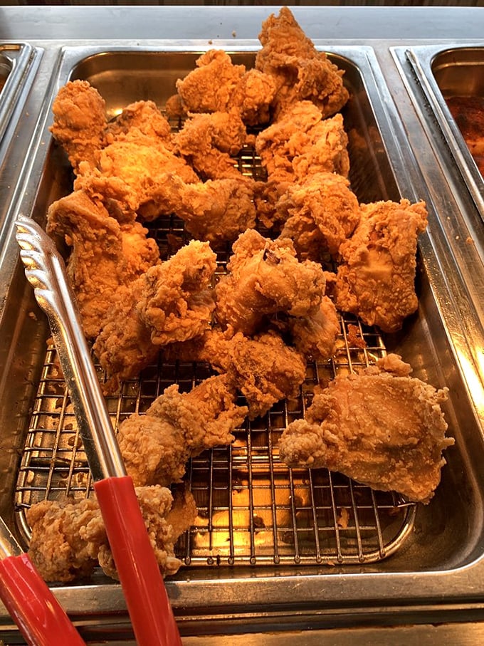 Fried chicken so golden and crispy, it deserves its own security detail. The Colonel would hand in his resignation letter.