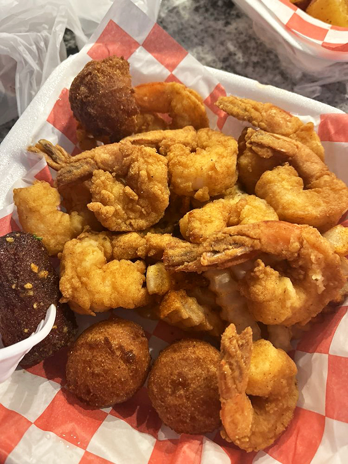 Golden-fried shrimp and hushpuppies &ndash; proof that sometimes the simplest preparations create the most profound pleasure.