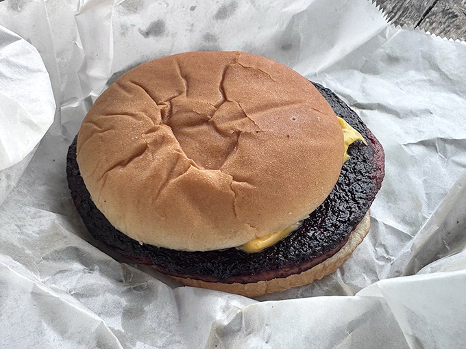 The humble bologna sandwich gets its moment of glory, with melted cheese cascading over edges like a delicious waterfall.