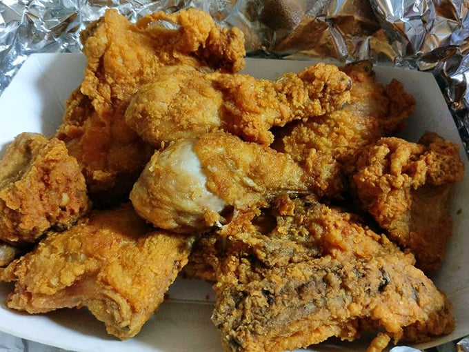 Each piece of chicken wears its golden crust like a badge of honor, promising a crunch that will echo through your food memories for years.