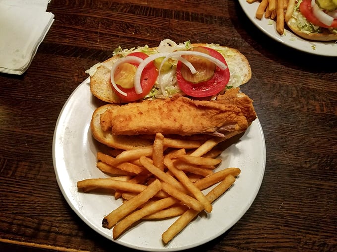 A proper po' boy should require both hands and several napkins&mdash;this golden-fried tilapia version delivers on that sacred sandwich promise.