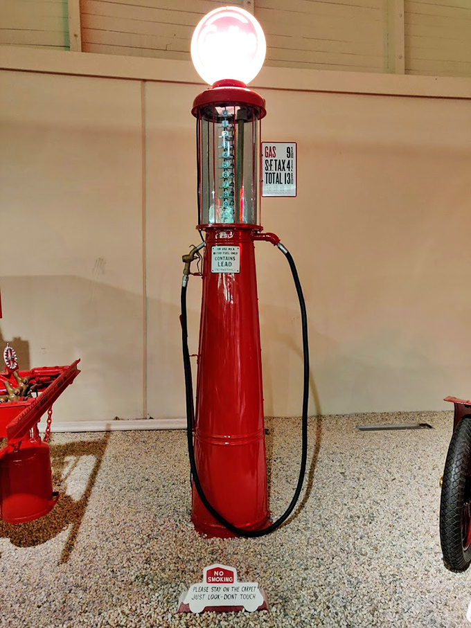 This vintage gas pump recalls an era when "fill 'er up" meant service with a smile and gas was measured in visible glass cylinders.