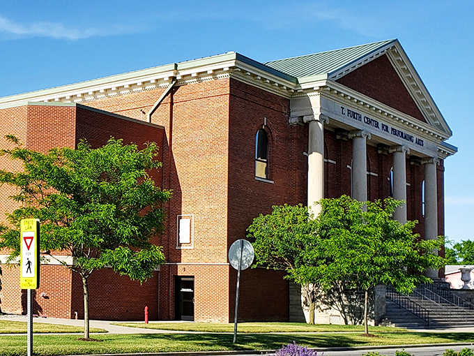 The T. Furth Center for Performing Arts brings cultural experiences to Angola with classical columns and red brick that say, "Culture lives here too."