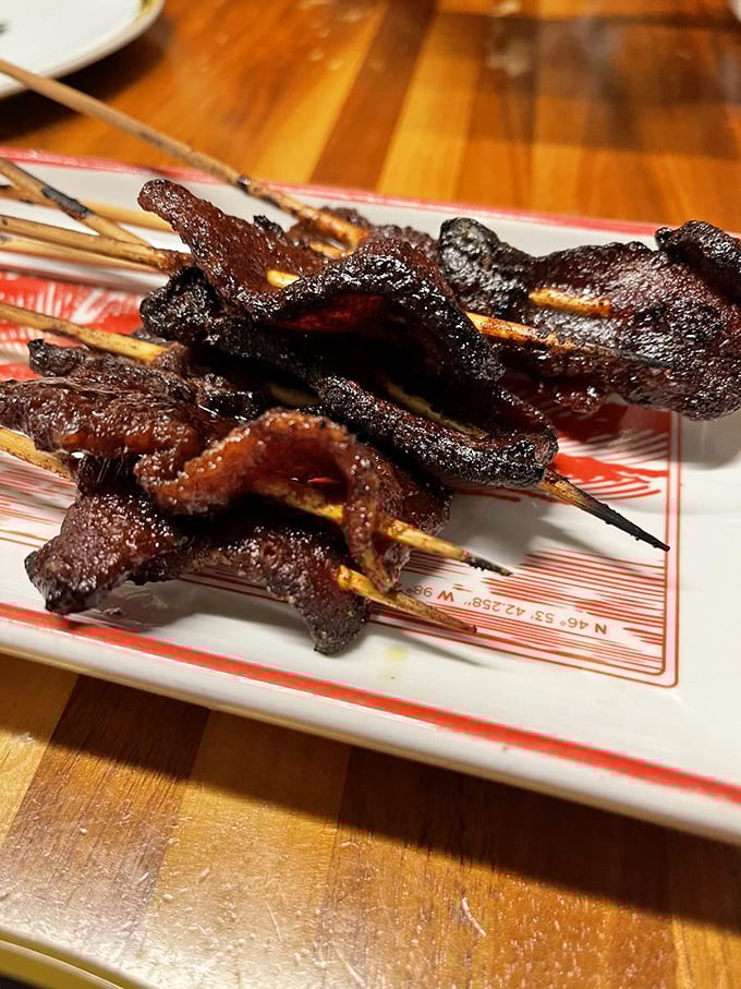 These aren't your average bacon strips&mdash;they're caramelized flavor bombs on sticks! Glazed to sticky-sweet perfection, they're the adult version of a carnival treat.