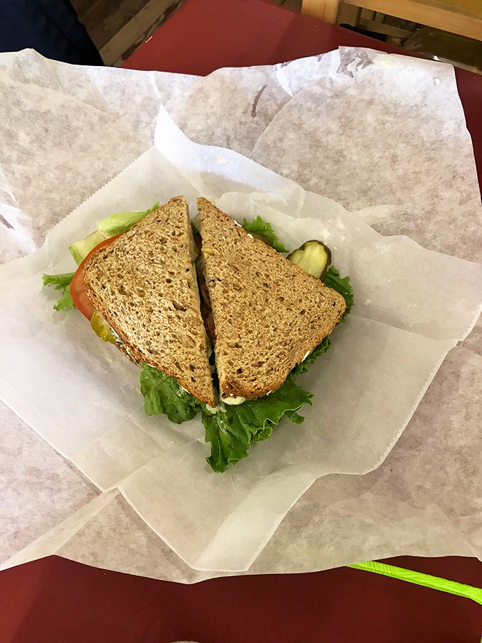 The Great Harvest Turkey Panini sits like edible art on butcher paper. Simple ingredients transformed into something that makes you want to write home.