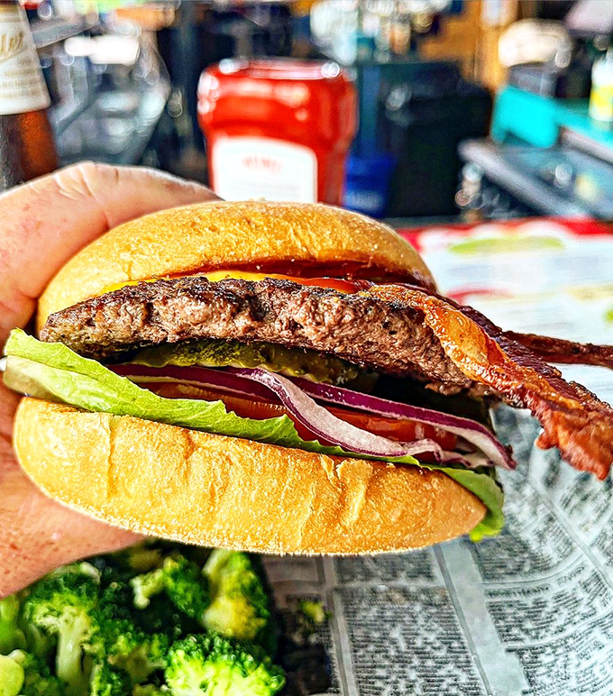 A burger that requires a strategic approach and multiple napkins – the kind that makes conversation impossible until you've tackled the last bite.