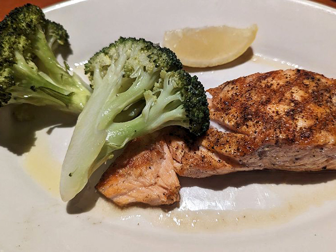 The salmon arrives perfectly flaked, seasoned just enough to enhance rather than mask nature's own brilliant recipe.