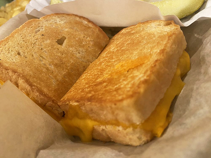 Behold the grilled cheese in its natural habitat&mdash;golden-brown, butter-kissed bread embracing a molten core of cheese that stretches with each bite like a dairy-based magic trick.