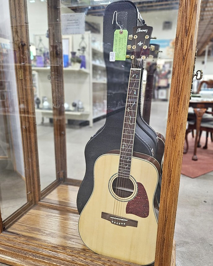 This Ibanez acoustic isn't just a guitar; it's someone's abandoned rock star dreams waiting for your fingers to revive them.