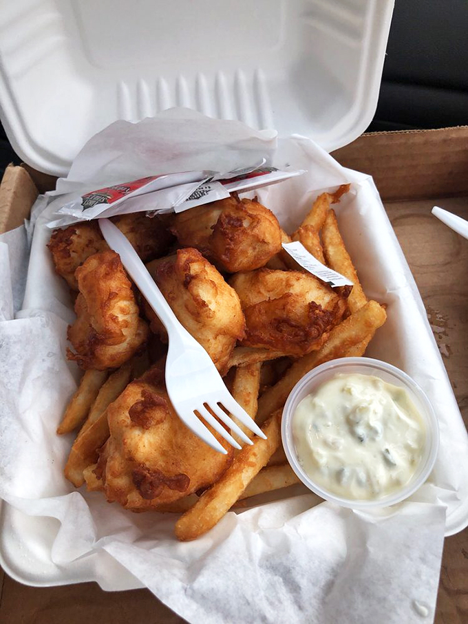 Sunlight dances on golden fish that flakes perfectly with the slightest fork pressure. This is what vacation memories are made of.