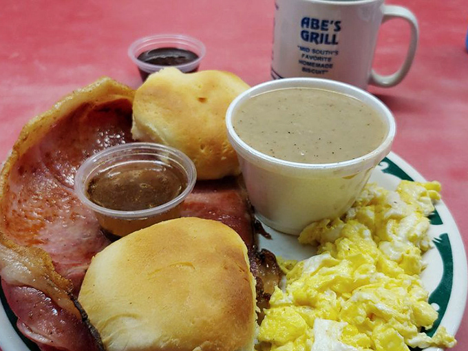 Country ham, golden biscuits, and gravy - the Holy Trinity of Southern breakfast, served with the reverence it deserves.
