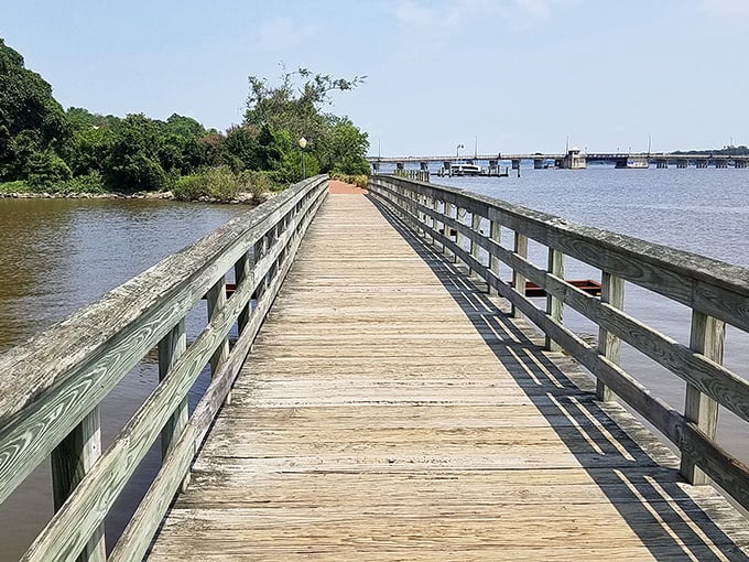 This wooden boardwalk stretches toward the horizon like a promise&mdash;of adventure, of solitude, of that perfect Instagram shot your friends will secretly envy.