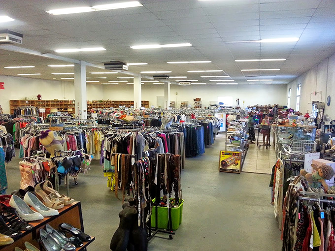 The clothing department stretches toward the horizon – a fabric landscape where your next favorite outfit is hiding somewhere between racks.