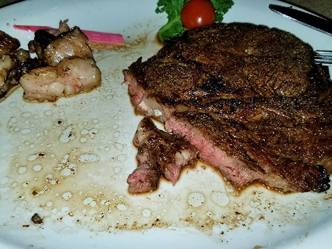 Medium-rare perfection that makes you understand why cavemen discovered fire. This steak doesn't need conversation&mdash;it speaks for itself.