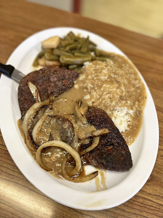 Liver and onions&mdash;the dish that separates the culinary adventurers from the tourists. That gravy could make anything taste like a revelation.
