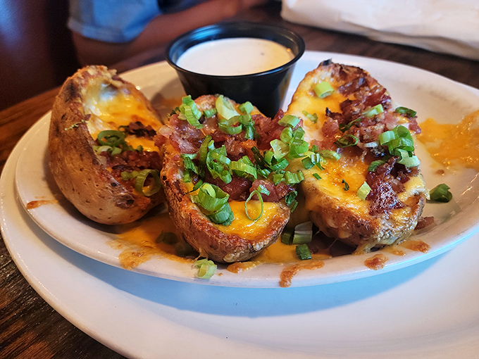 Potato skins that could make a cardiologist weep&mdash;gloriously loaded with cheese, bacon, and green onions. Diet books should include a chapter called "Exceptions."
