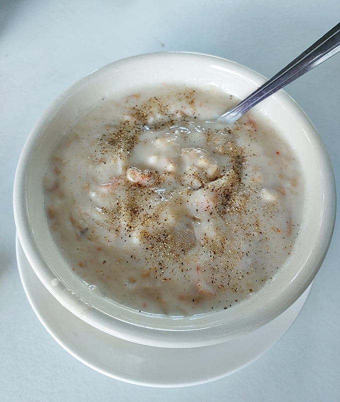 Their Lobster Bisque isn't just soup; it's a creamy, seafood-infused hug in a bowl that makes you wonder why you'd ever eat anything else.