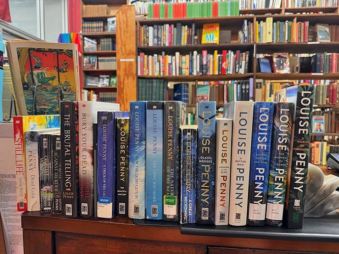 A lineup of Louise Penny mysteries, like old friends waiting for a reunion. Inspector Gamache would approve of this meticulous arrangement.