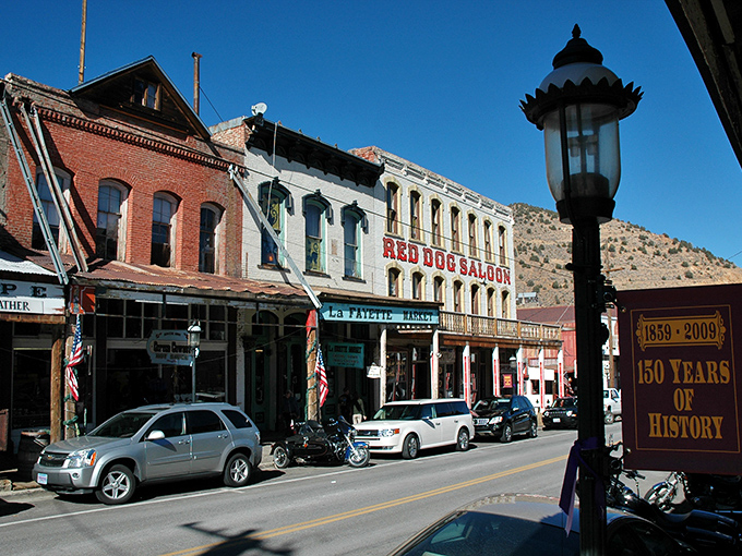 The Red Dog Saloon sign pops against the historic buildings of C Street, where Janis Joplin once performed for lucky locals.