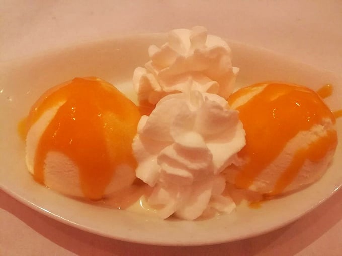 Dessert that looks like the sun decided to take a bath in cream. These golden spheres of sweetness make the perfect finale.