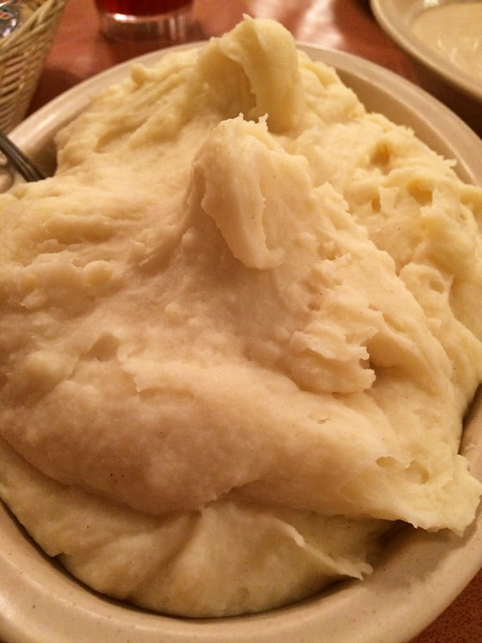 Cloud-like mashed potatoes that make you question why anyone would ever eat the instant kind. Comfort in a bowl, no prescription required.
