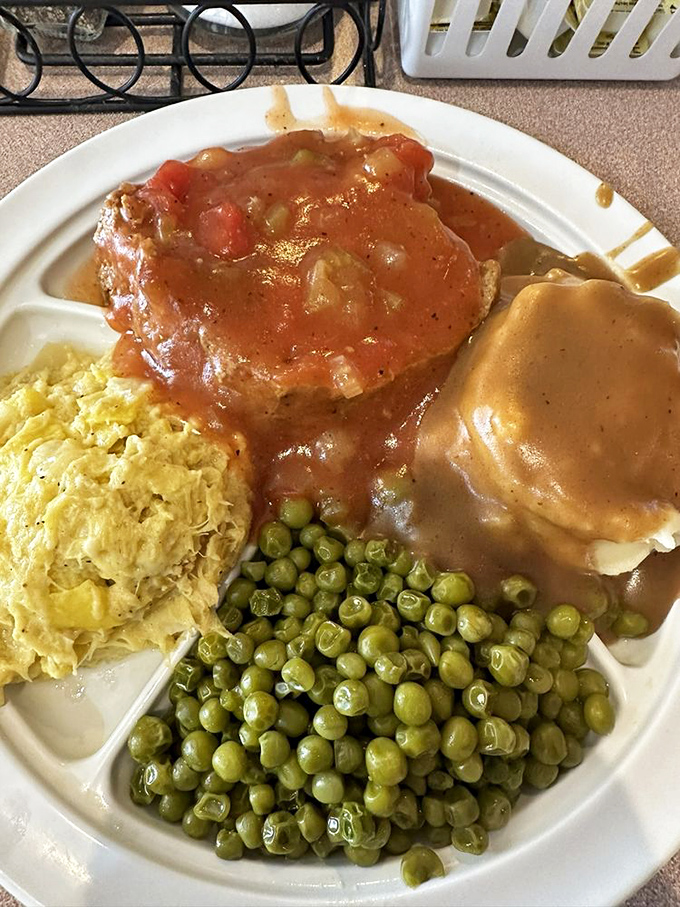 Meatloaf that would make your grandmother both proud and jealous, crowned with a tomato sauce that means business.