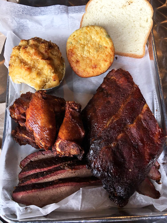 The barbecue sampler that has launched a thousand diet cheat days. Brisket's smoke ring is practically winking at you.