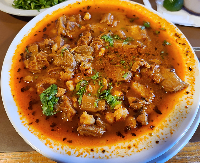 Menudo: the legendary hangover cure that doubles as culinary revelation. This aromatic broth with tender tripe is Mexico's gift to your morning after.