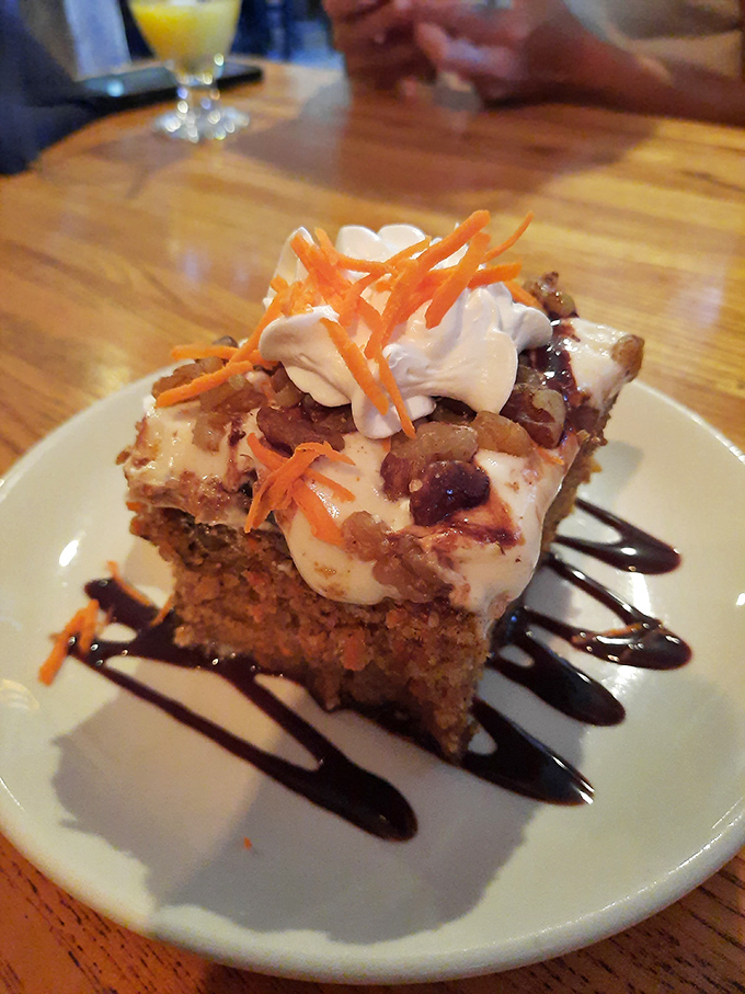 Carrot cake to-go means tomorrow's breakfast is already planned. The little cup of extra frosting? That's what I call excellent customer service.