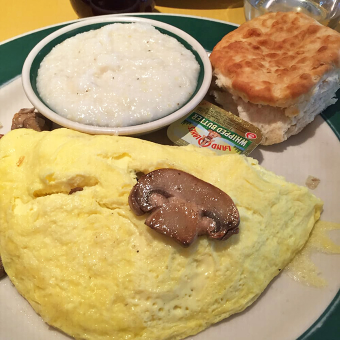Mushroom hunters rejoice! This omelet showcases fungi at their finest, alongside grits that would make any Southerner proud.