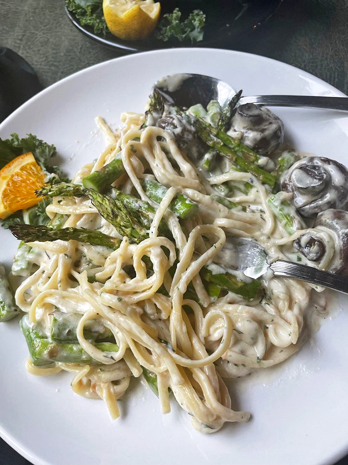 Creamy pasta that doesn't just hug the mushrooms and asparagus&mdash;it throws them a full-on celebration. Comfort food with a sophisticated wink.