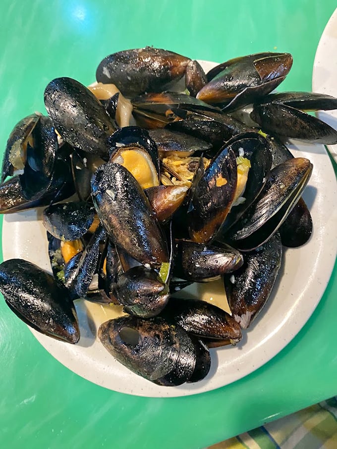 Mussels: nature's little black boxes of oceanic treasure. Each one a tiny surprise package from the sea to your plate.