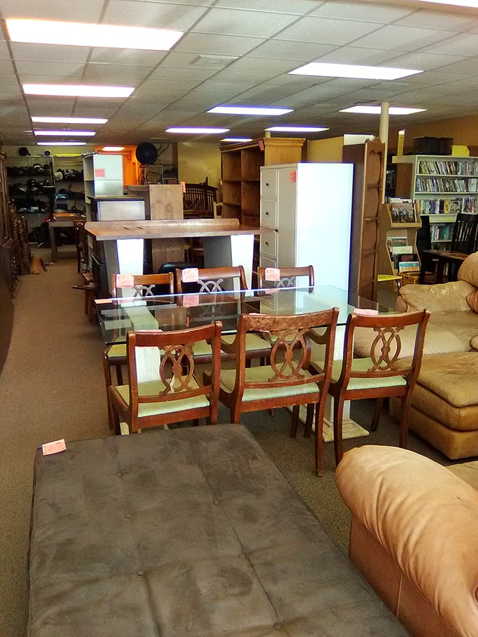 Furniture arranged with the chaotic precision of a yard sale curated by an interior designer with a sense of humor.