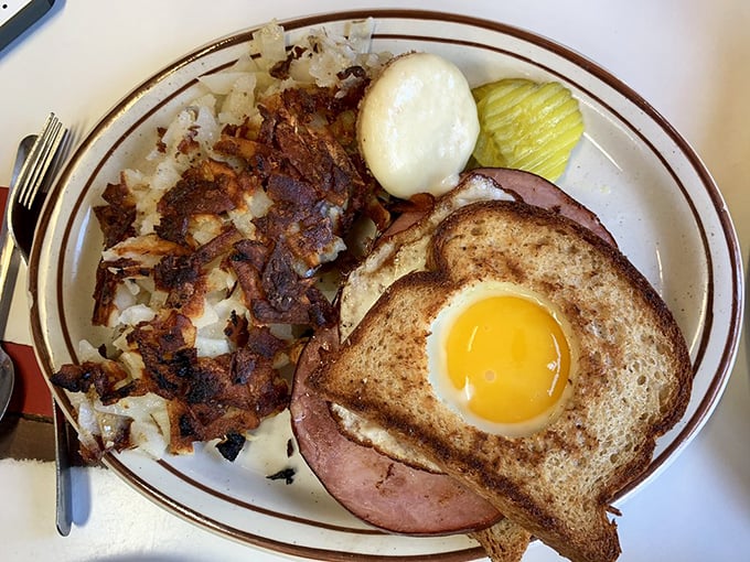 The One-Eyed Jack&mdash;where toast meets egg meets ham in holy matrimony, creating the breakfast equivalent of hitting the jackpot.