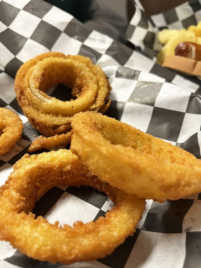 Golden halos of crispy, battered goodness. These onion rings aren't just sides—they're the main event's worthy co-star.