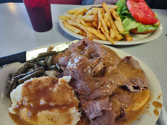 Roast beef that doesn't so much "melt in your mouth" as "make you question why you ever eat anything else." The gravy-to-potato ratio here is mathematical perfection.