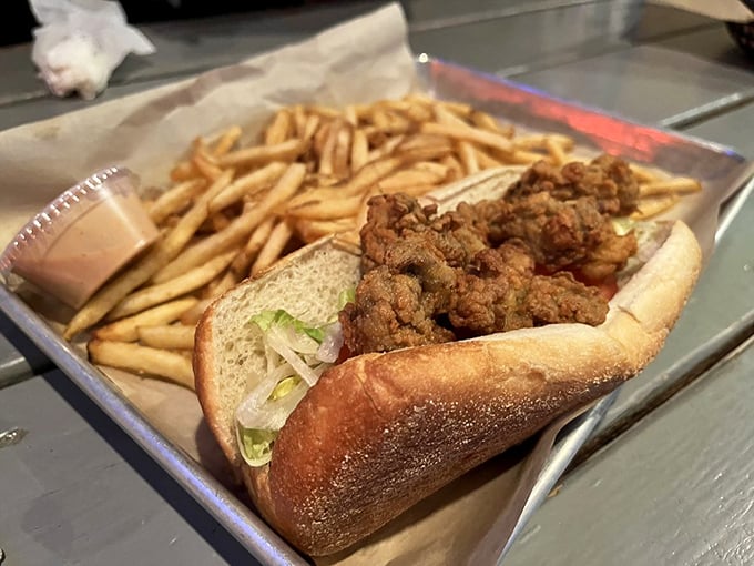 The Oyster Po'Boy: proof that sometimes the best things in life require both hands and absolutely zero concern for looking dignified while eating.