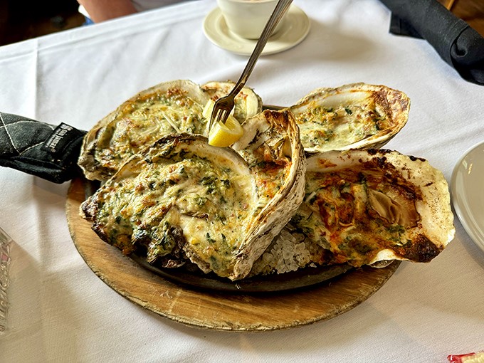 Oysters Rockefeller so decadent they should come with their own tax bracket. That golden cheese crust is what dreams are made of.