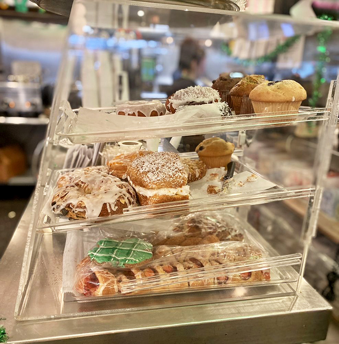 The pastry case—where willpower goes to die and diet plans are forgotten. Those muffins are giving you "the look."