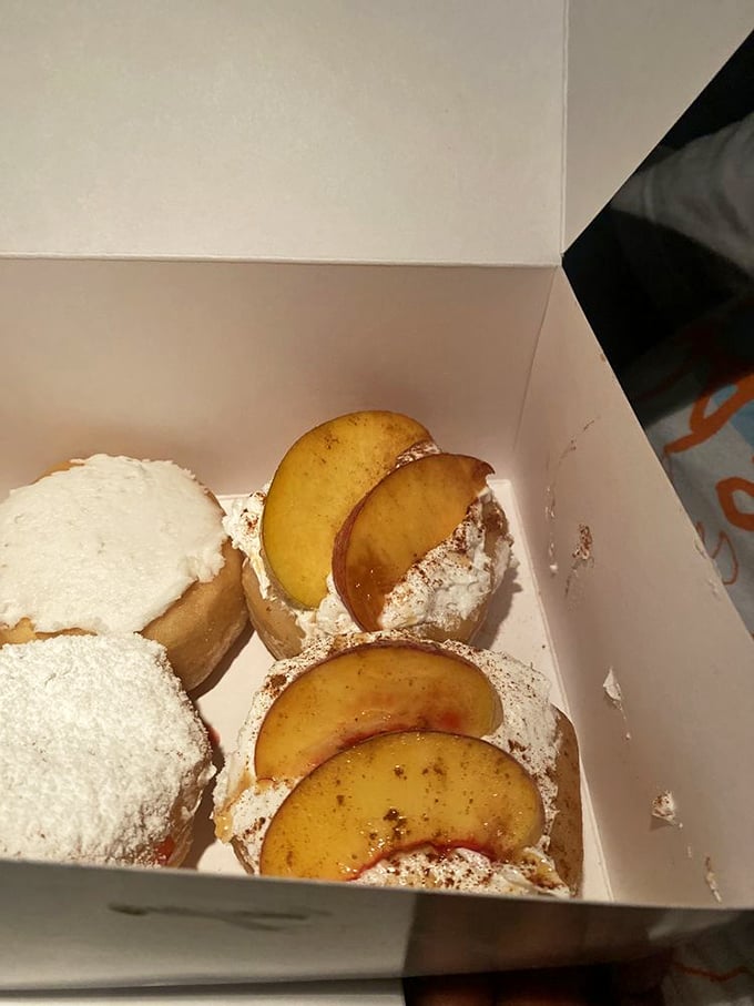 These peach-topped cream donuts don't need Instagram filters to look irresistible. Mother Nature and Krumpe's, collaborating on a masterpiece of simple deliciousness.