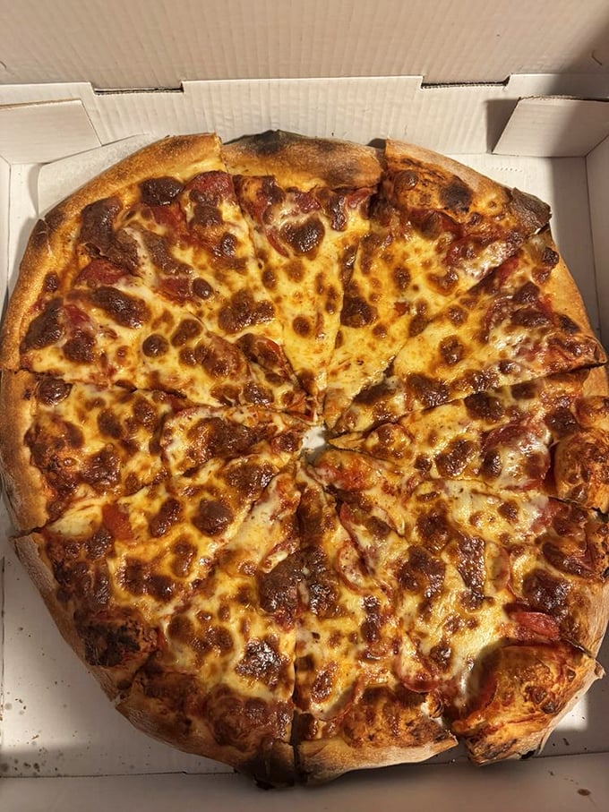 The pepperoni pie's charm lies in its simplicity &ndash; those perfectly crisped edges curling up to form tiny cups of savory flavor bombs.