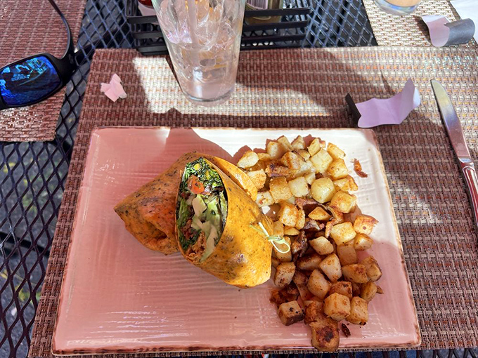 Breakfast wraps should always look this good. Golden potatoes nestled beside a perfectly rolled package of morning goodness—the ideal portable feast.